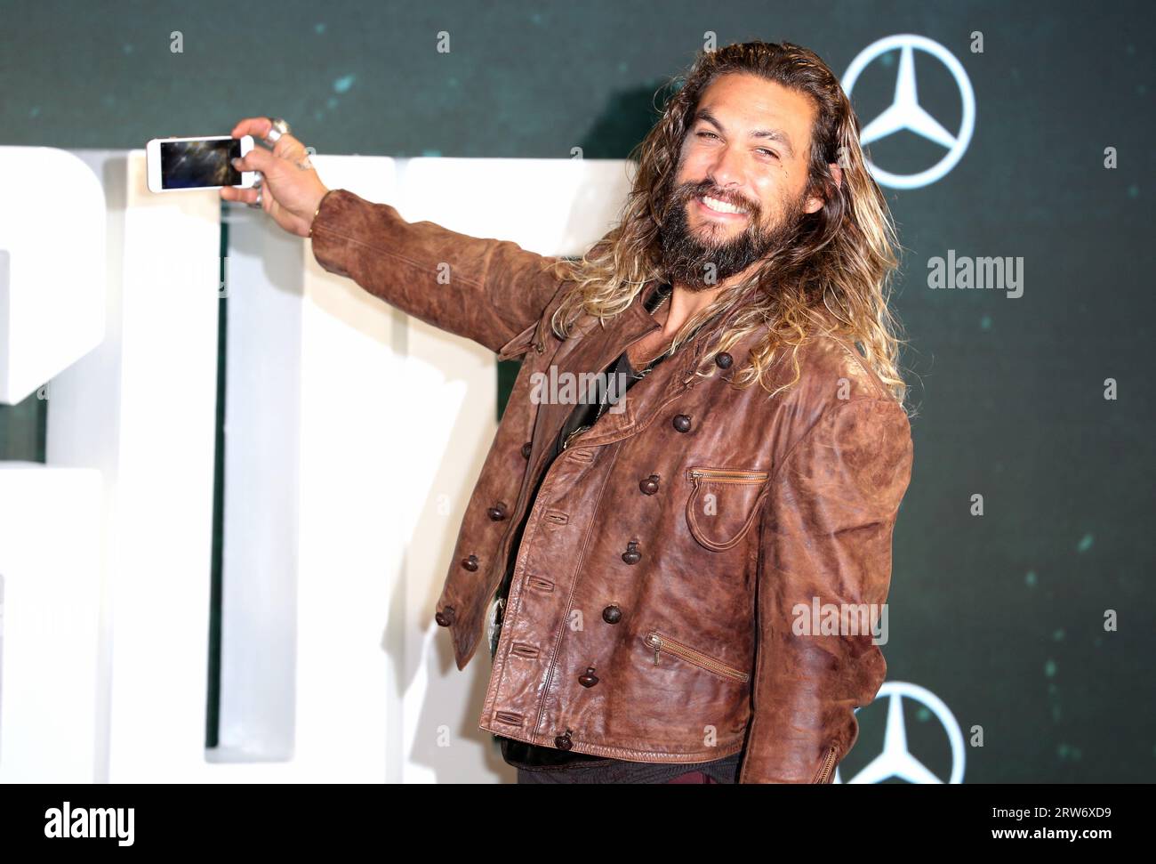 Jason Momoa attends the 'Justice League' photocall at The College in ...