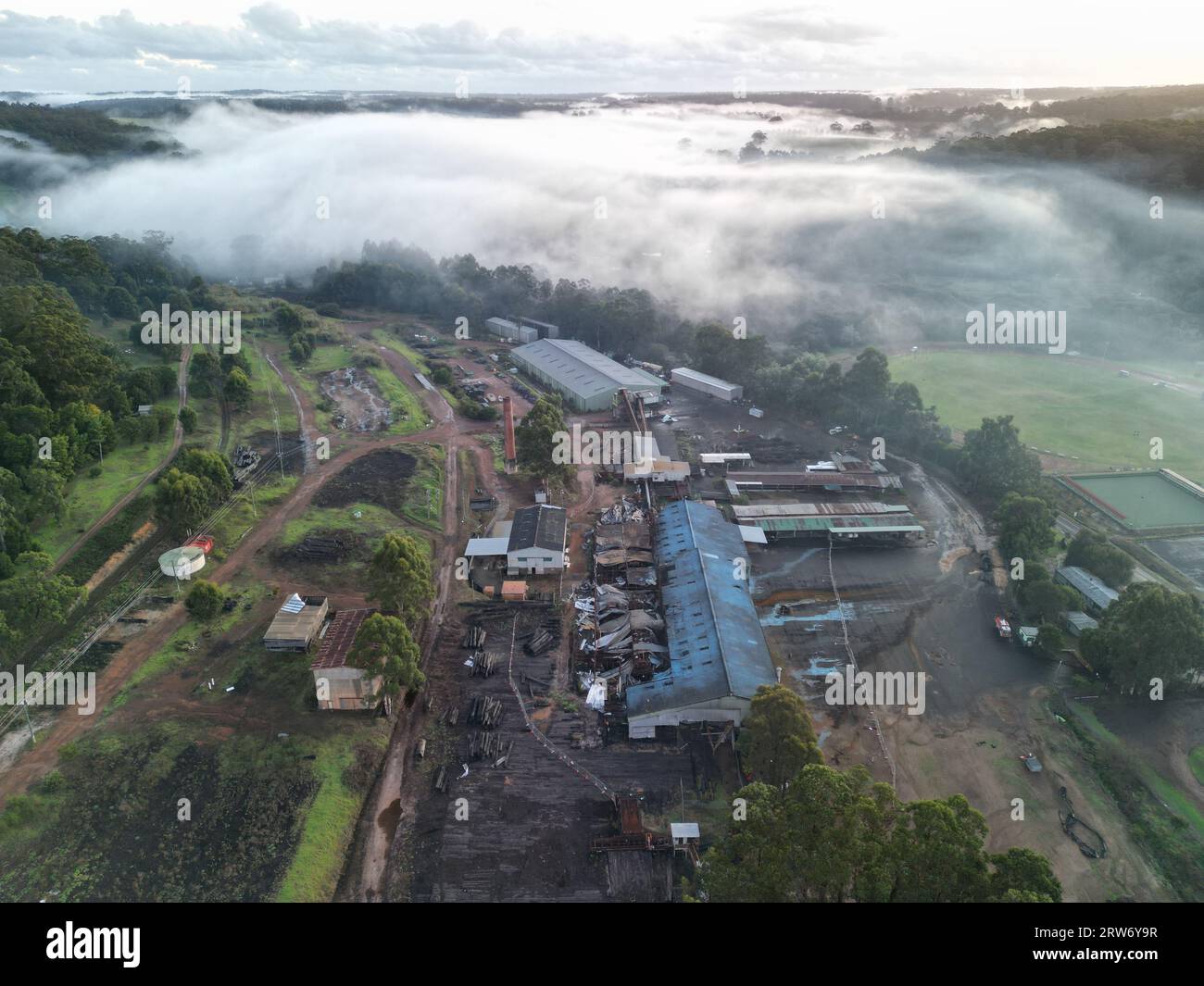 An Aerial view of dog over derelict and fire damaged Pemberton Timber ...