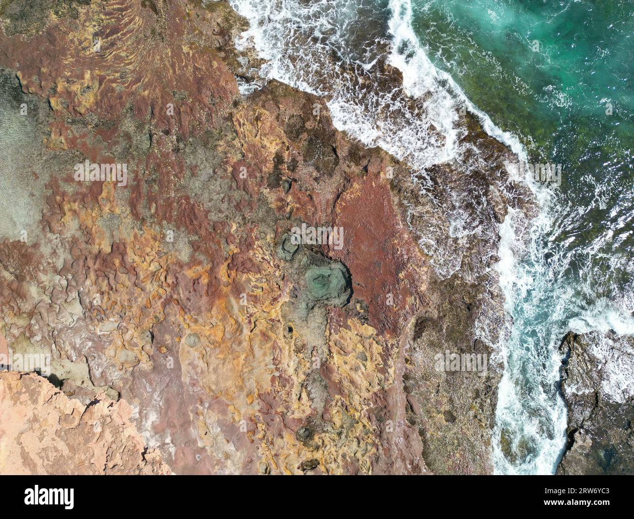 An Ariel drone shot of ocean shore and waves, Eagle Gorge, Kalbarri ...