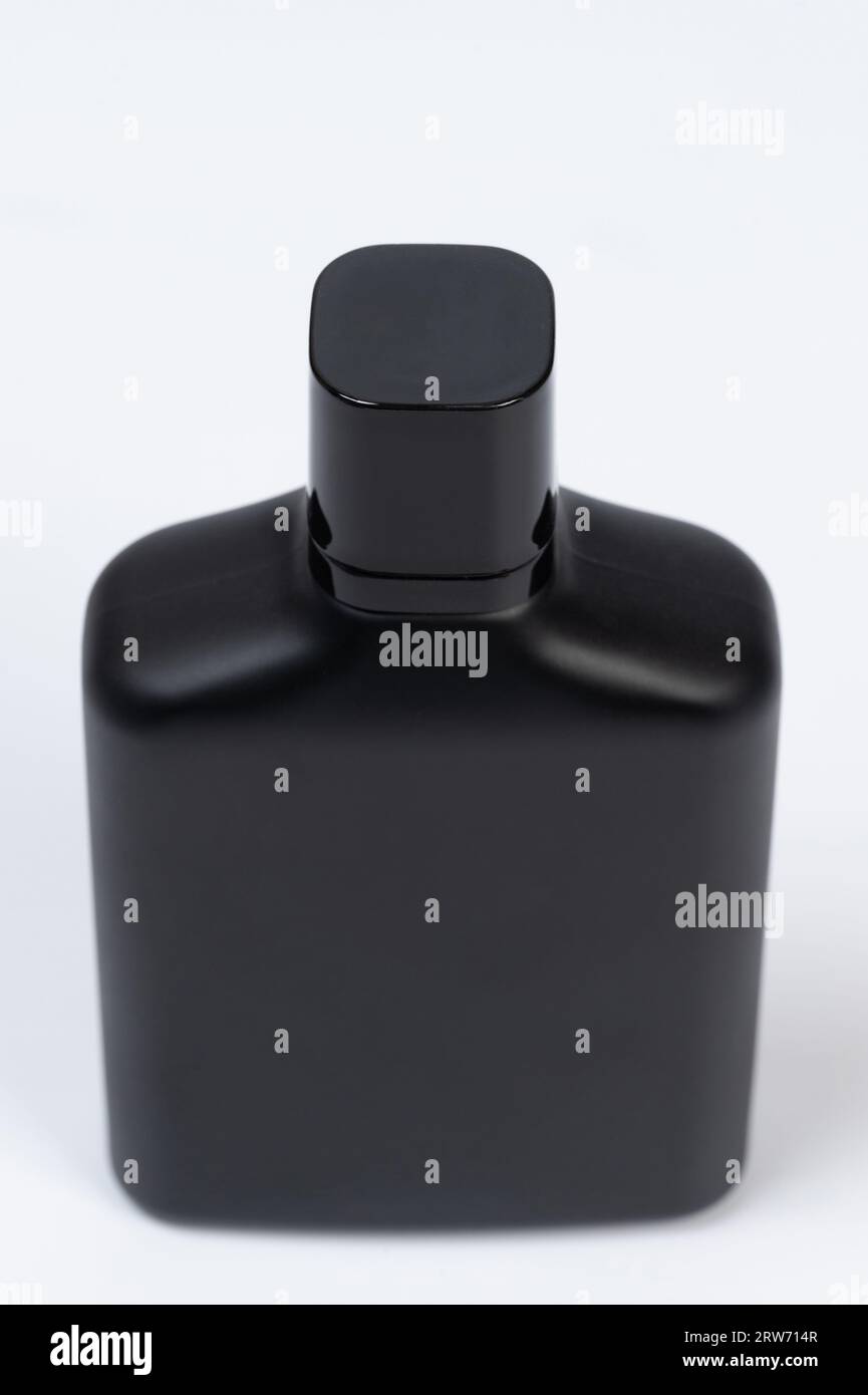 Clean black perfume bottle above front view isolated on studio ...