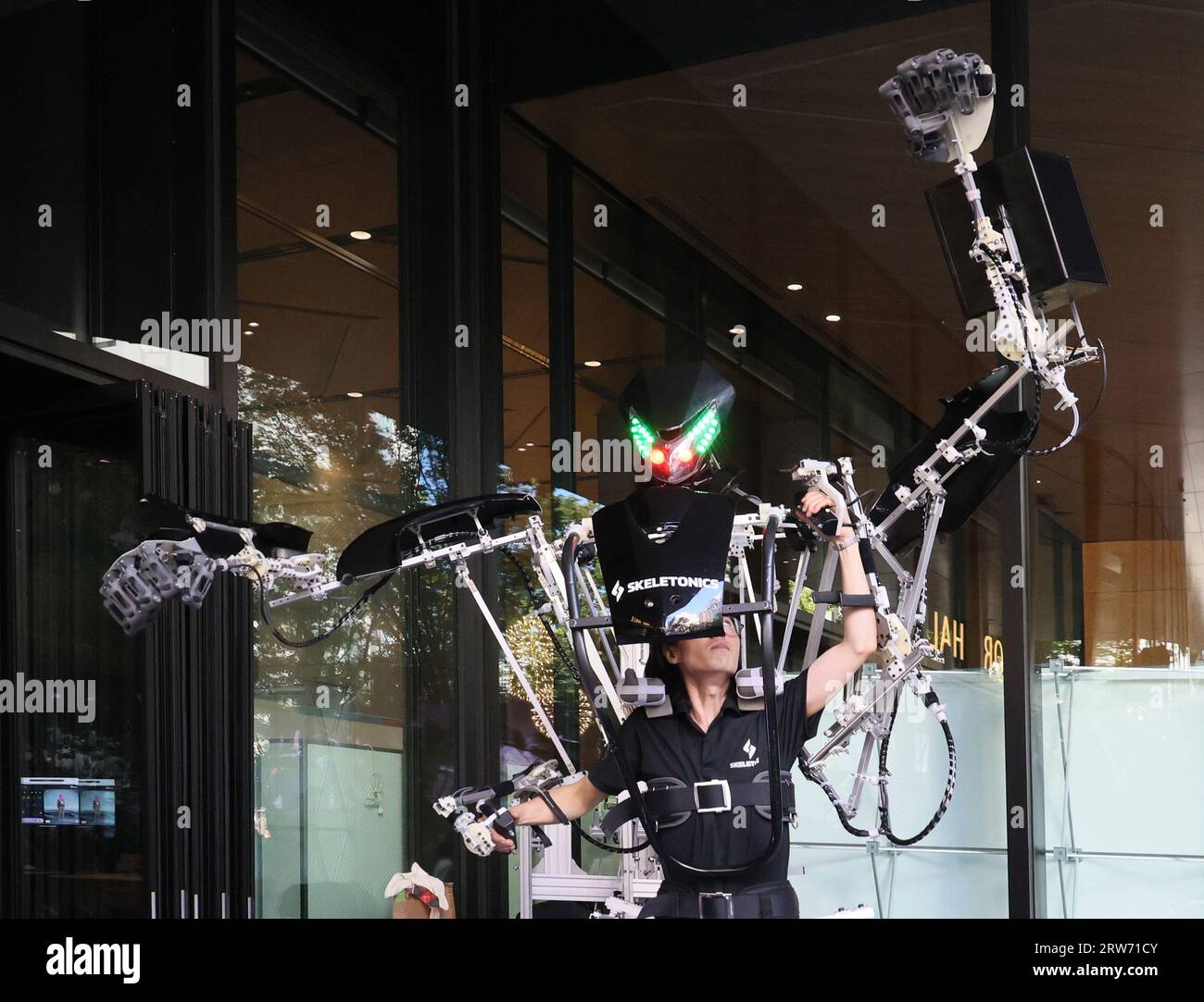 Tokyo, Japan. 17th Sep, 2023. A man demonstrates a 3-meter tall ...