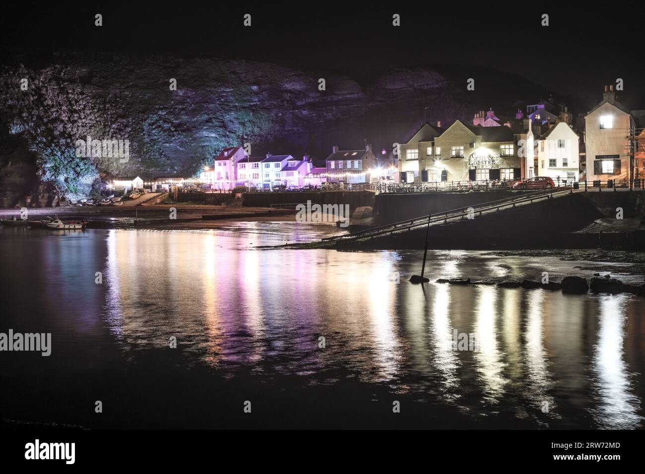 Staithes Harbour at Night Illuminated with Colourful Lighting During ...
