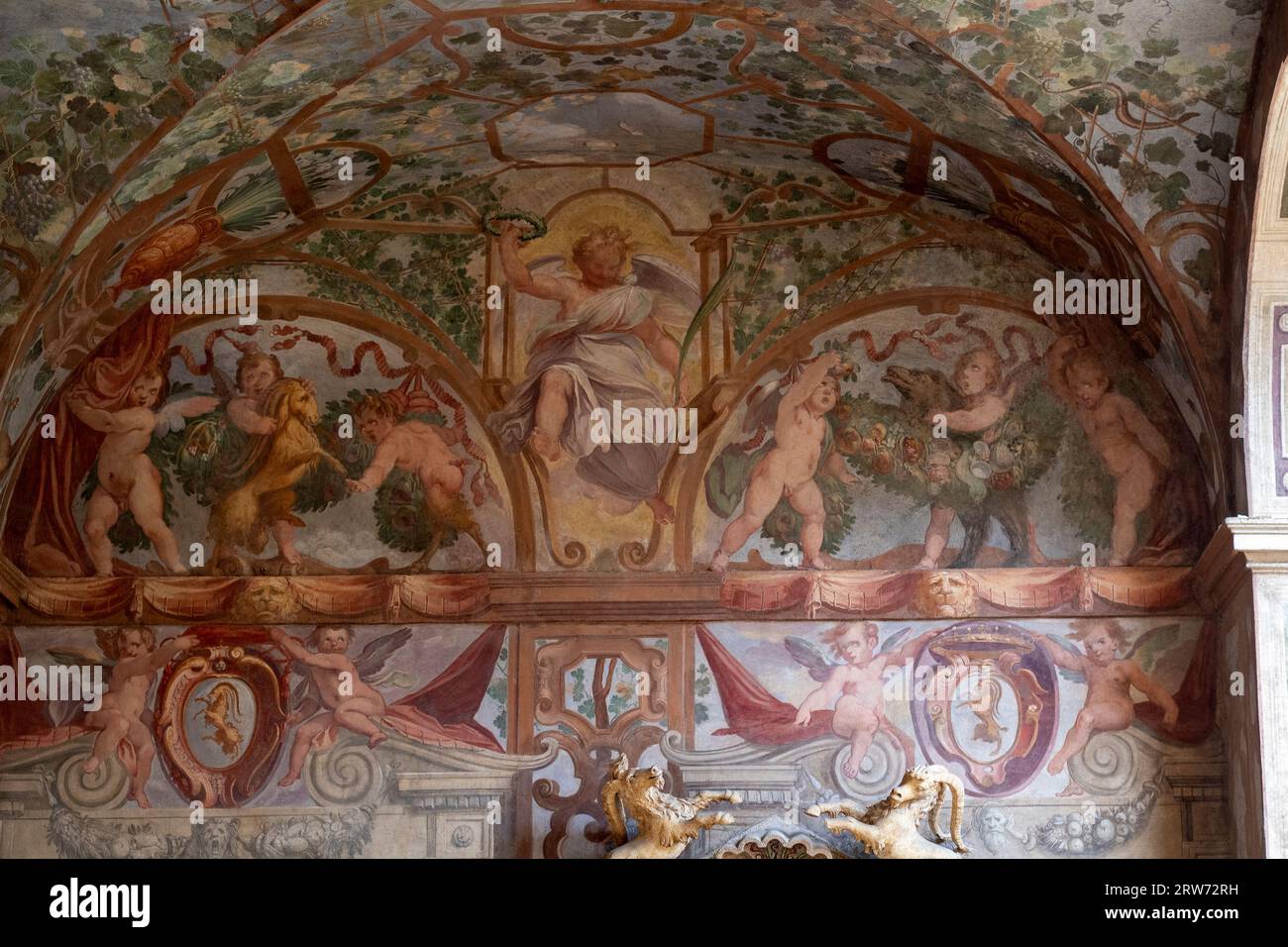 A beautiful fresco on display of angles in a garden Stock Photo - Alamy