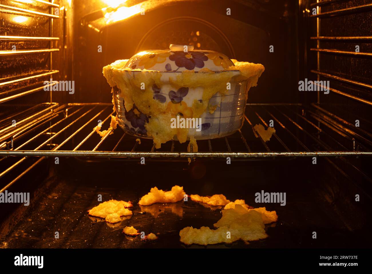 Overcooked apples explosion in electric oven Stock Photo - Alamy