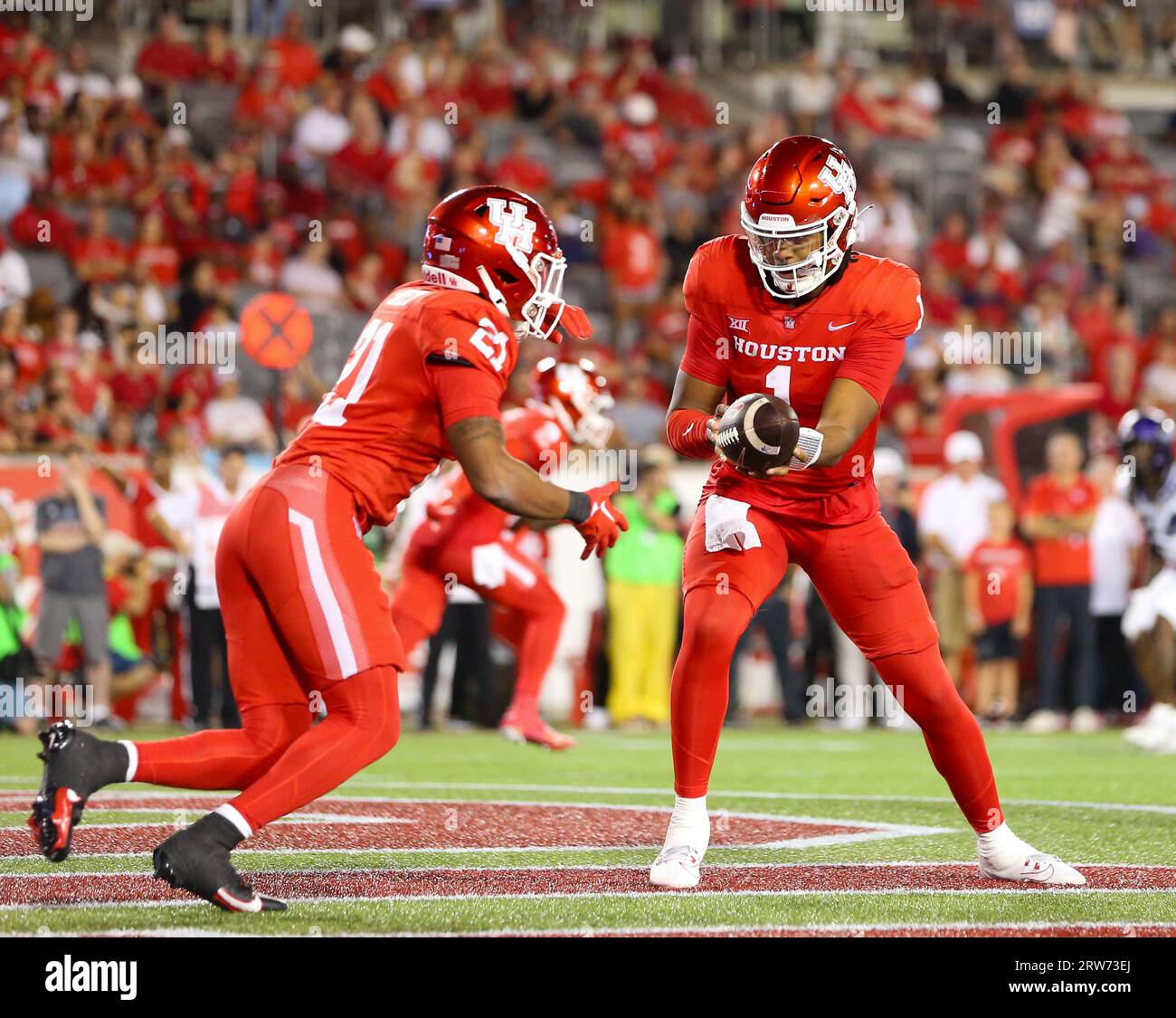 September 16, 2023: Houston quarterback Donovan Smith (1) hands the ...