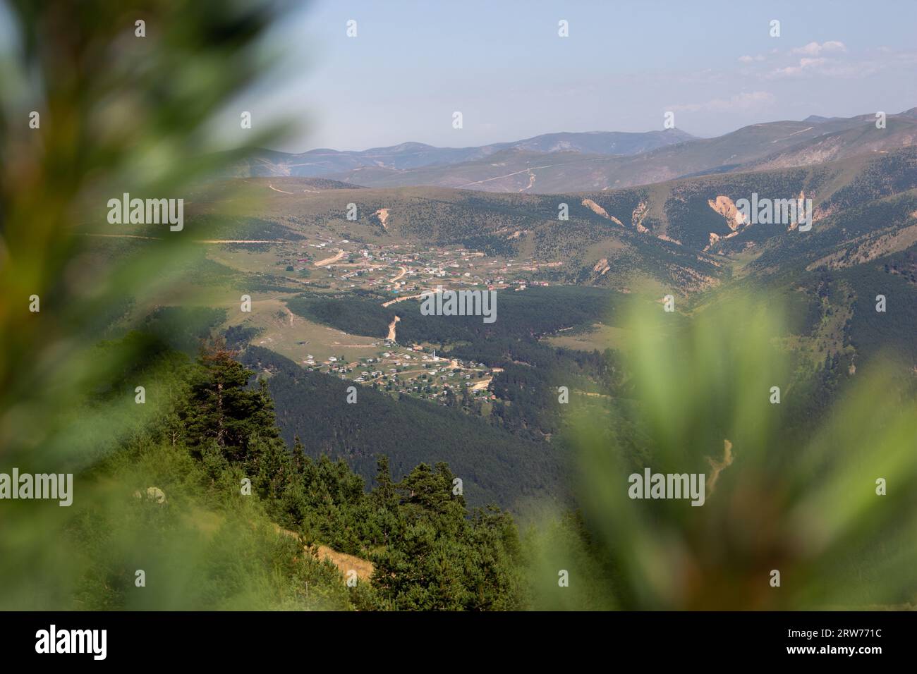 A village in the forest on a high mountain. Plateau life in Turkey ...