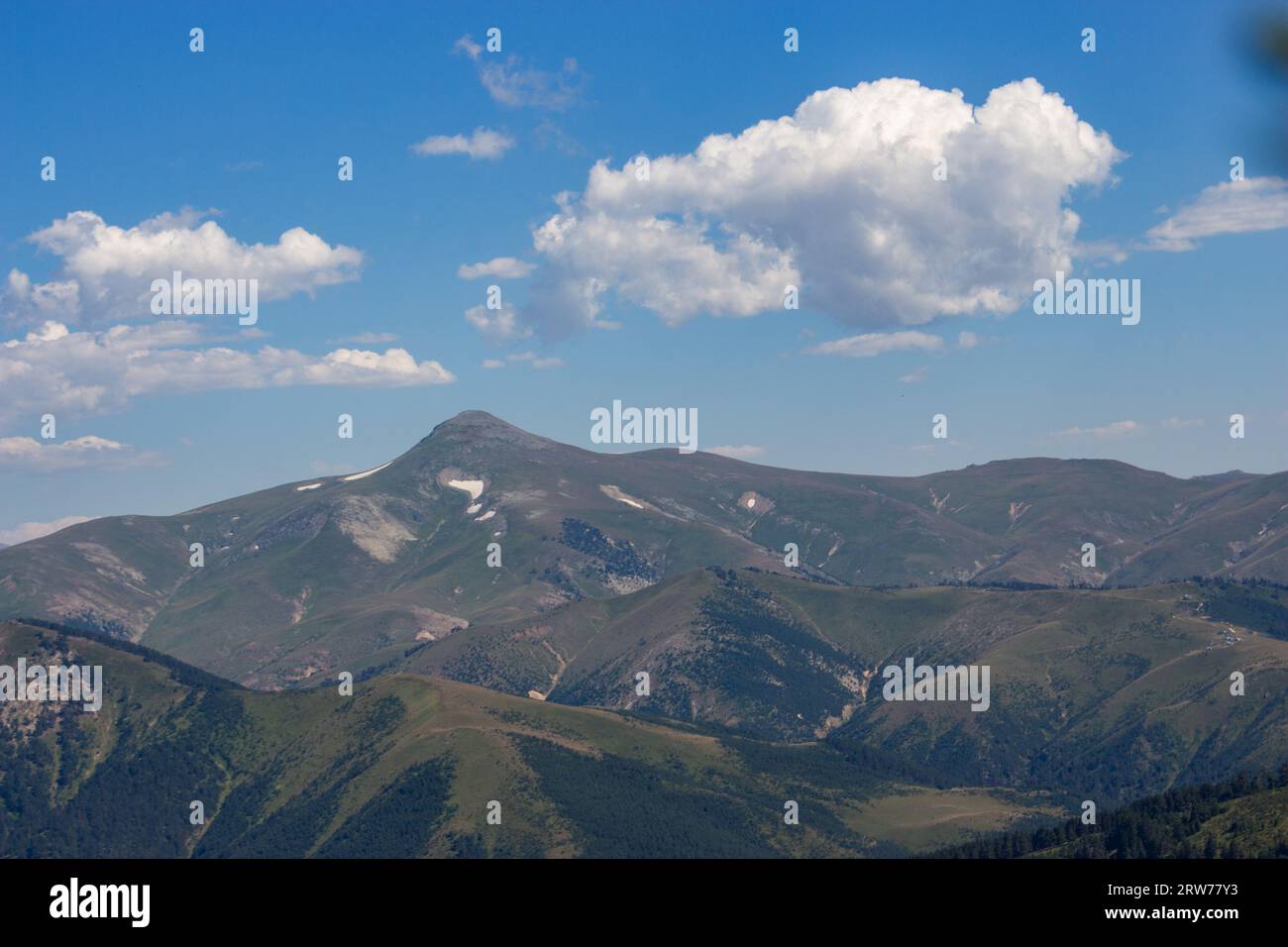 high mountain summit view with clouds on sunny day. Rural life in ...