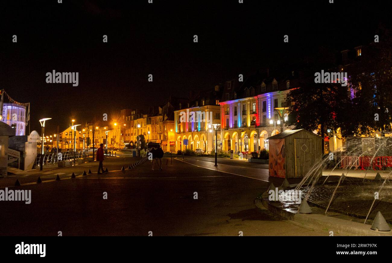 Buildings and fountain lit up at night in Dieppe , Normandy Dieppe is a ...