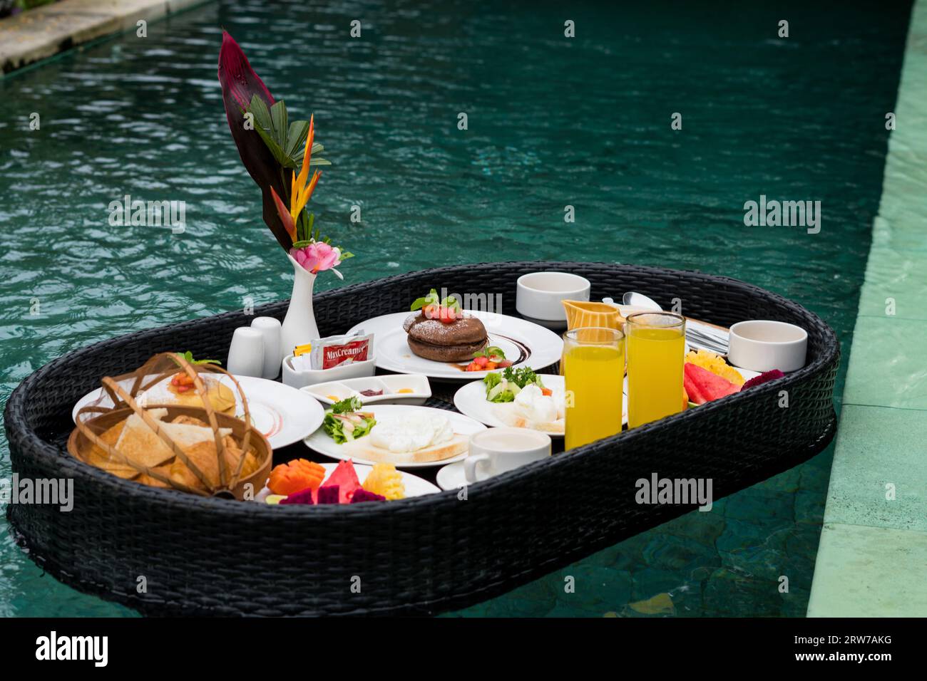 Breakfast tray in swimming pool hi-res stock photography and images - Alamy