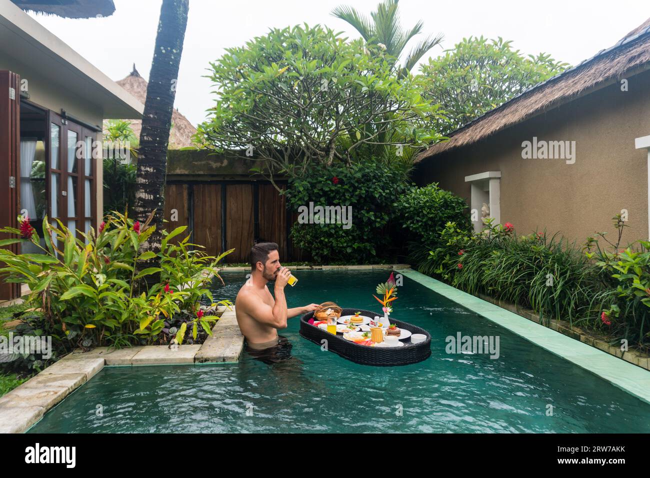 Floating Brakfast tray in private swimming pool in Ubud Bali Stock ...