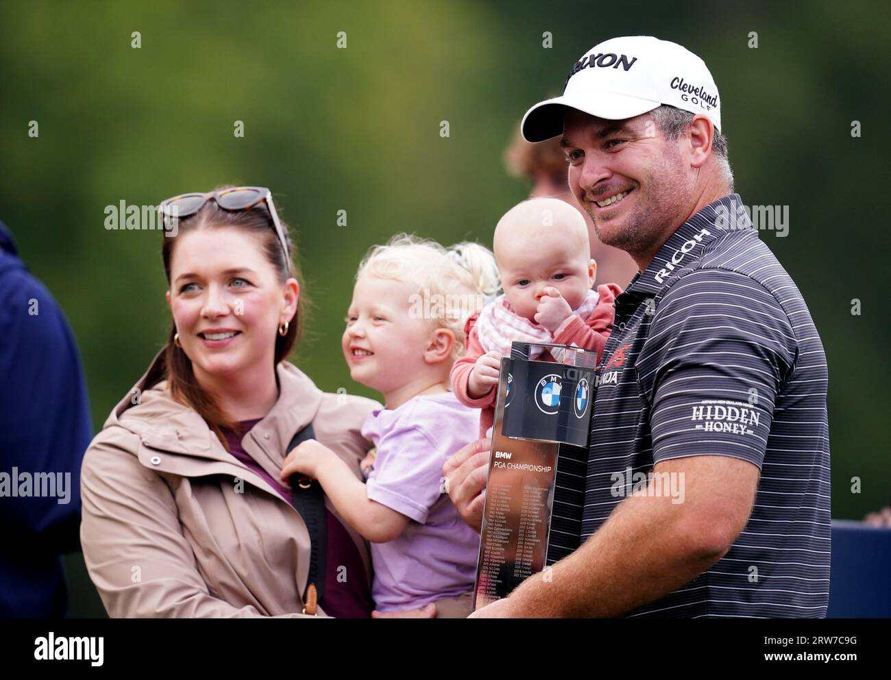 Ryan Fox poses with the trophy with wife Anneke Ryff and daughters ...