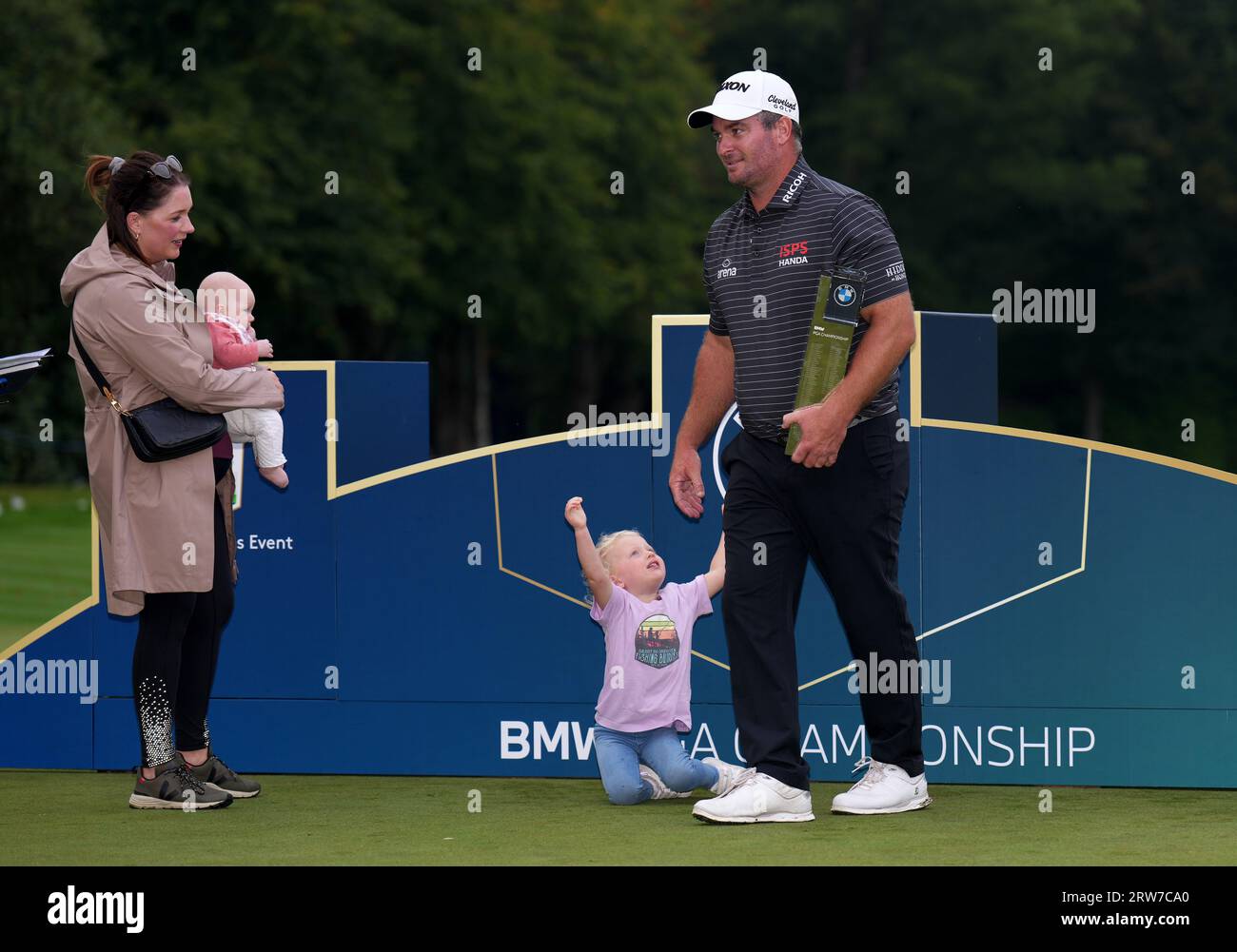Ryan Fox holding the trophy with wife Anneke Ryff and daughters Margot ...