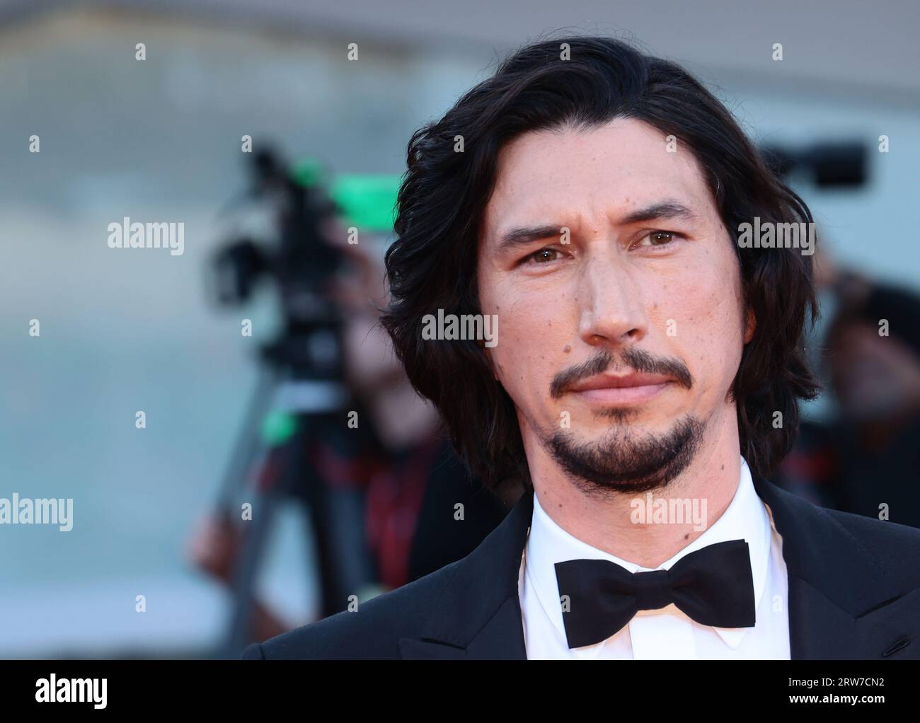 VENICE, ITALY - AUGUST 31: Adam Driver attends a red carpet for the movie "Ferrari" at the 80th ...