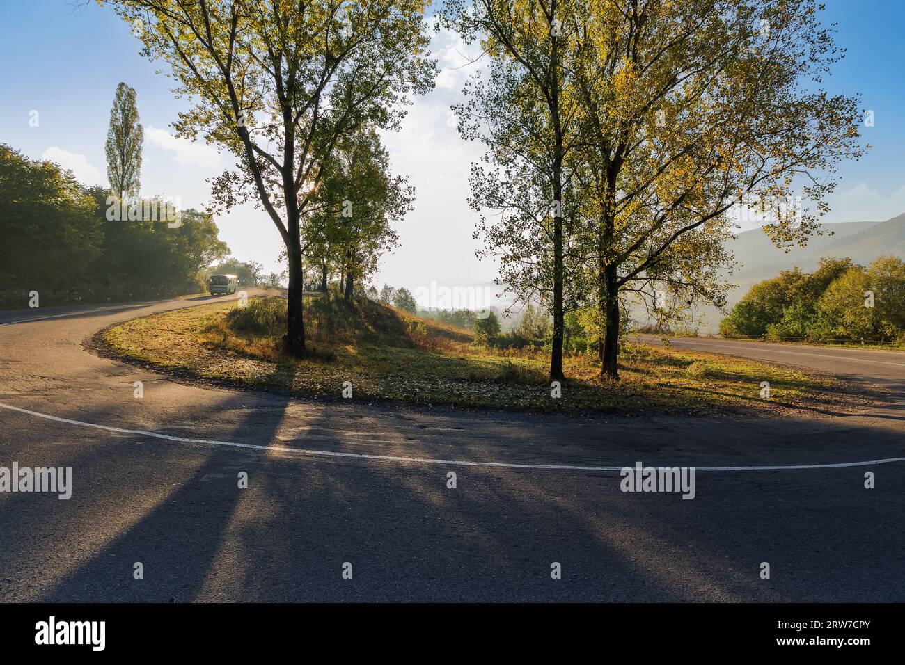 pass through mountainous countryside. asphalt road turnaround ...