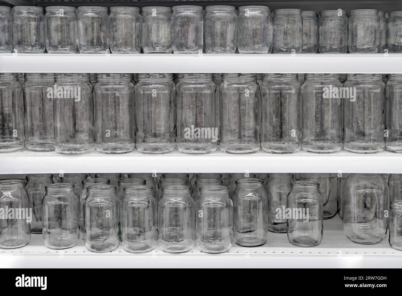 Glass jars on the shelf in the store, transparent background Stock ...