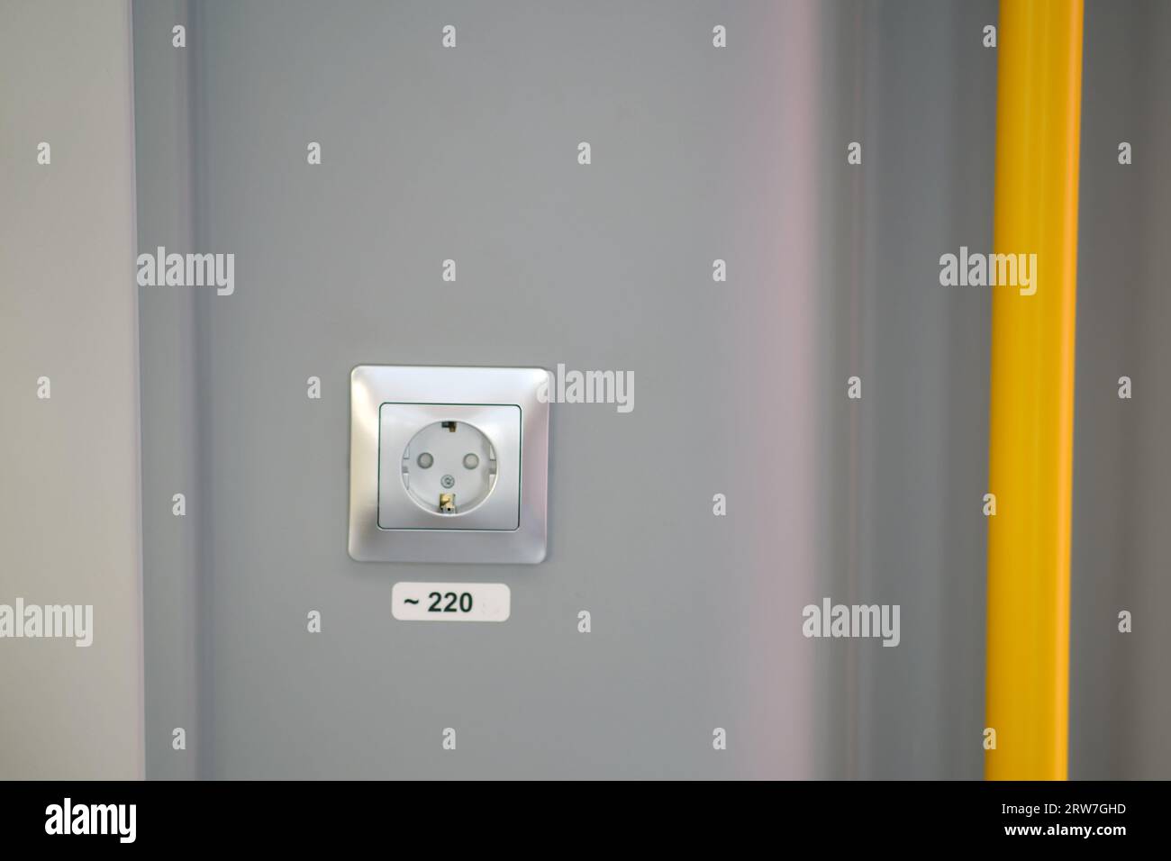 Interior of a train with an electrical outlet Stock Photo - Alamy