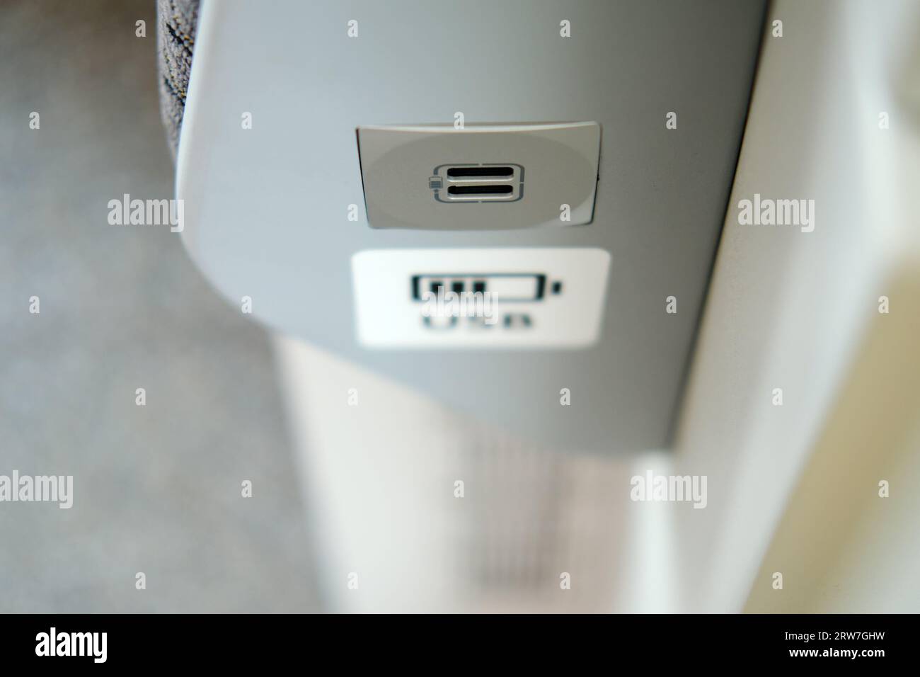 USB port for charging a phone as an interior detail of public passenger ...