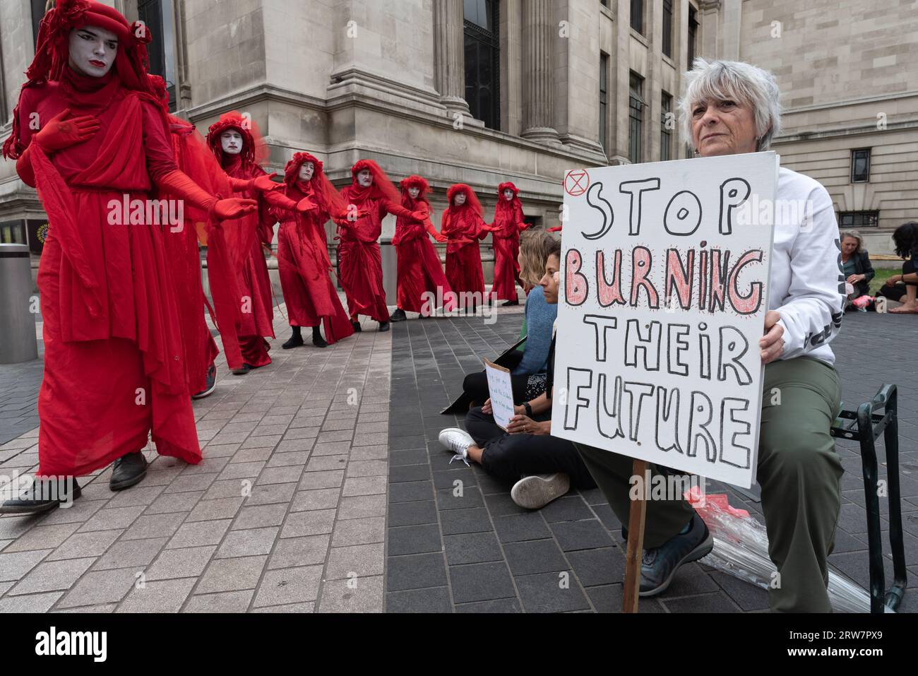 London, UK. 17 September, 2023. The Red Rebel Brigade activist mime ...