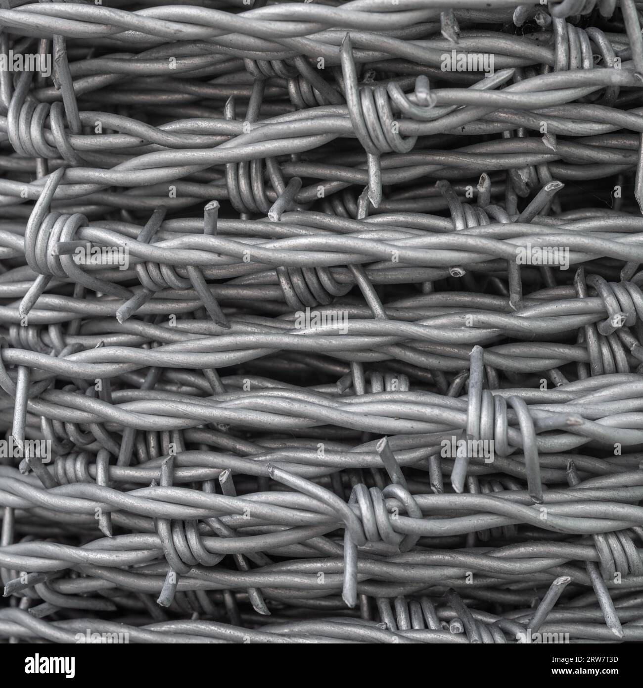 Abstract Background Texture Of Coiled Barbed Wire Stock Photo - Alamy