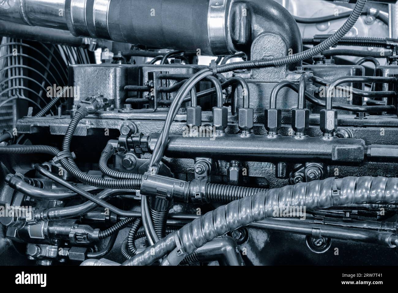 Black diesel engine. Fragment of a diesel motor close-up. Selective on ...