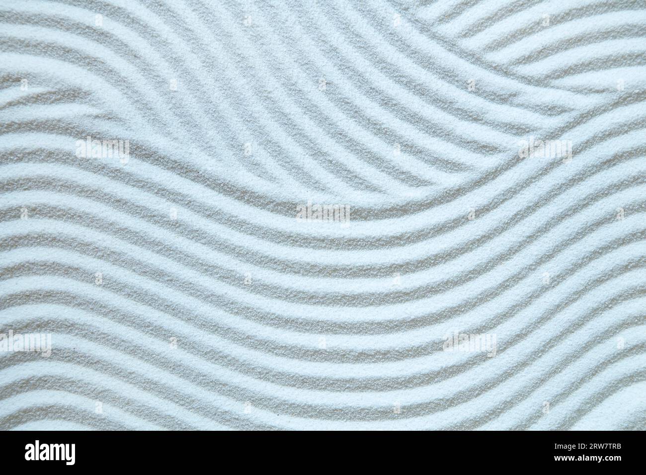 Zen pattern in white sand Stock Photo - Alamy
