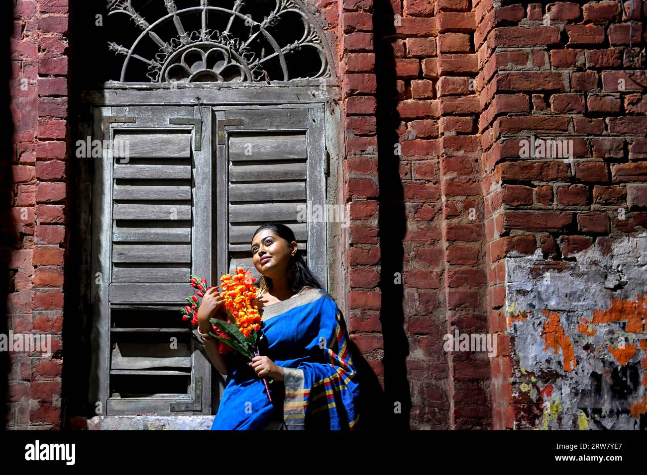 Fashion Model Rima Bhattacharya poses for a photo infront of an old ...