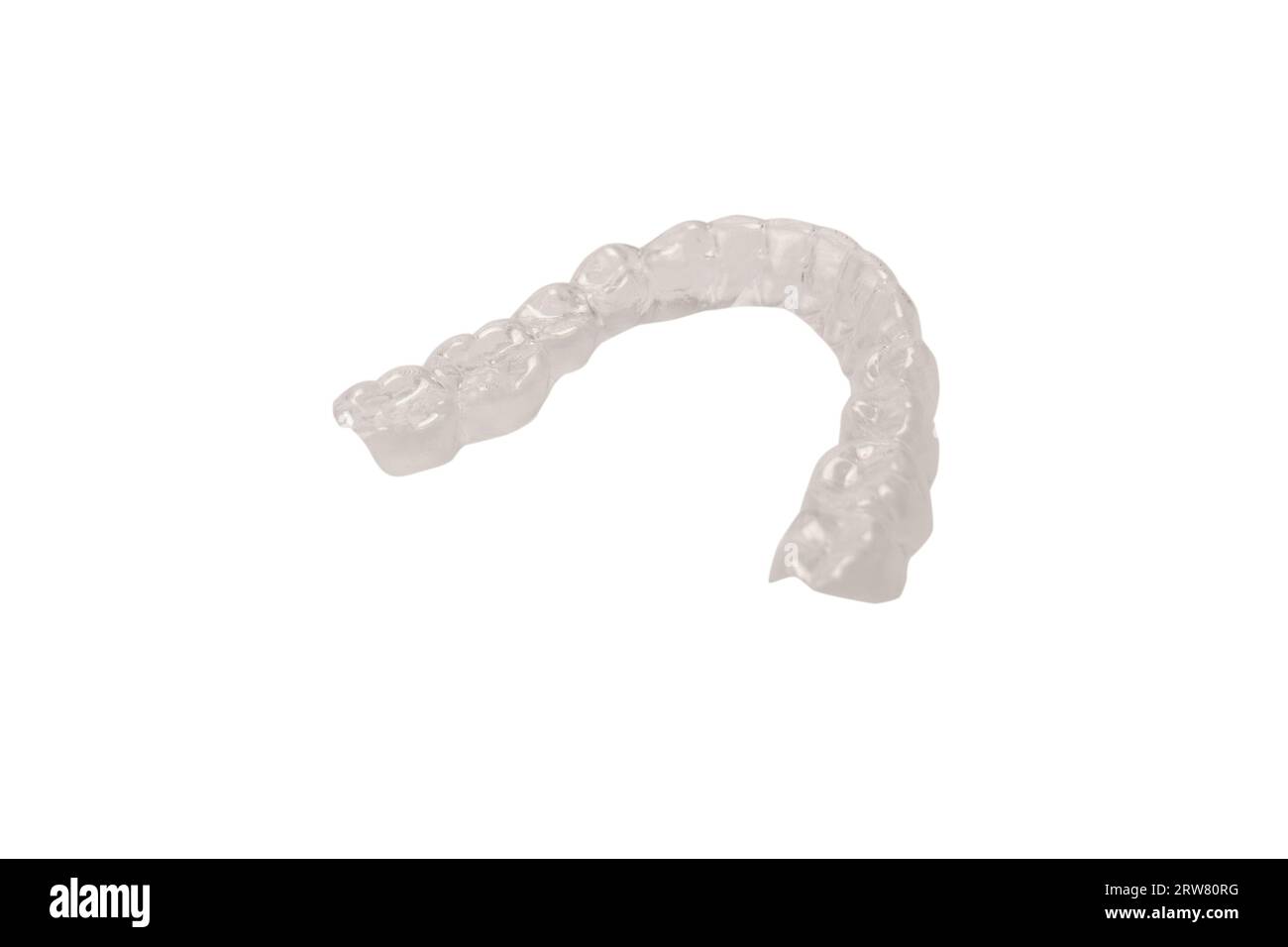 Transparent mouth guard isolated on a white background Stock Photo - Alamy