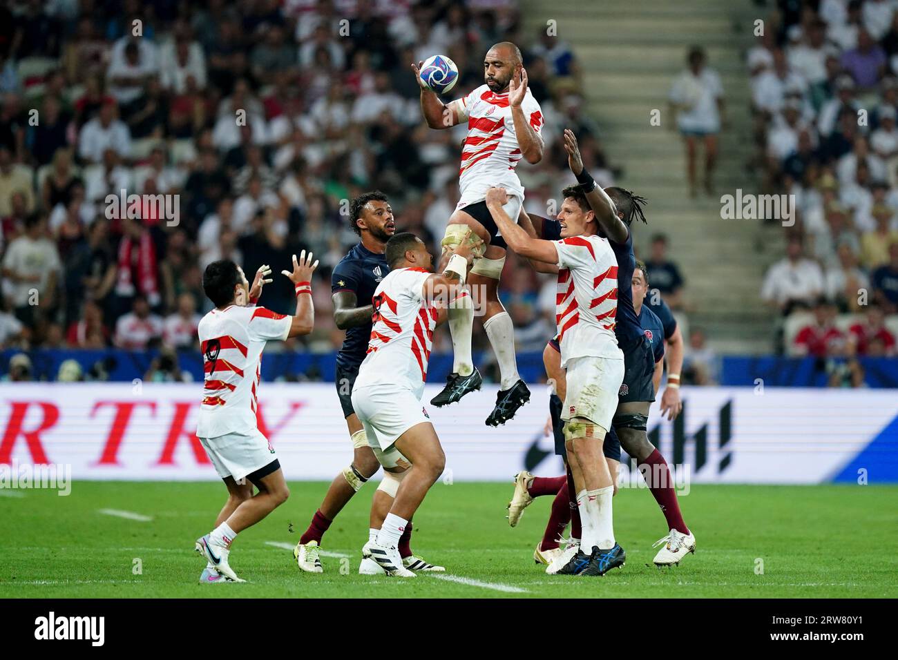 Japan's Michael Leitch passes the ball down from a lineout during the ...