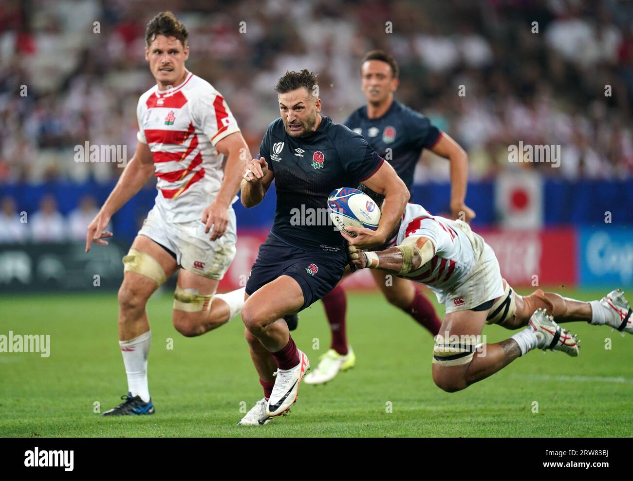 England's Jonny May tackled by Japan's Kazuki Himeno during the Rugby ...