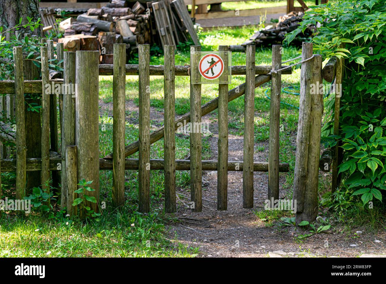 Sign on an old wooden fence, no entry Stock Photo - Alamy