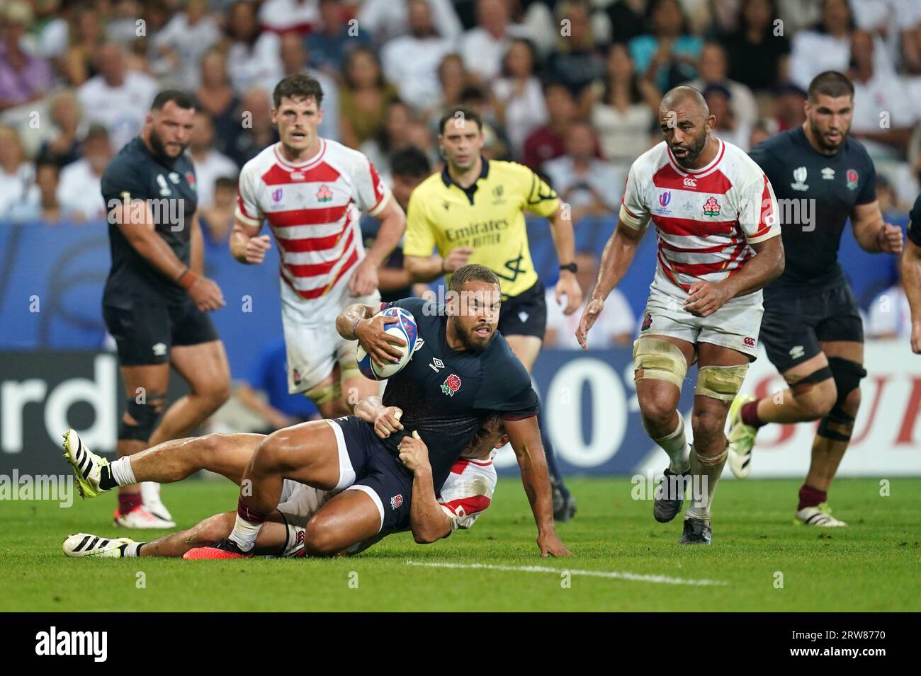 England's Ollie Lawrence tackled during the Rugby World Cup 2023, Pool ...