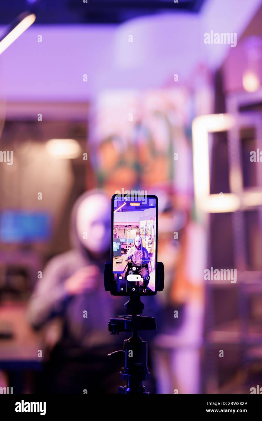 Anonymous Criminal Recording Malicious Activity On Smartphone Screen Hacker With Hidden