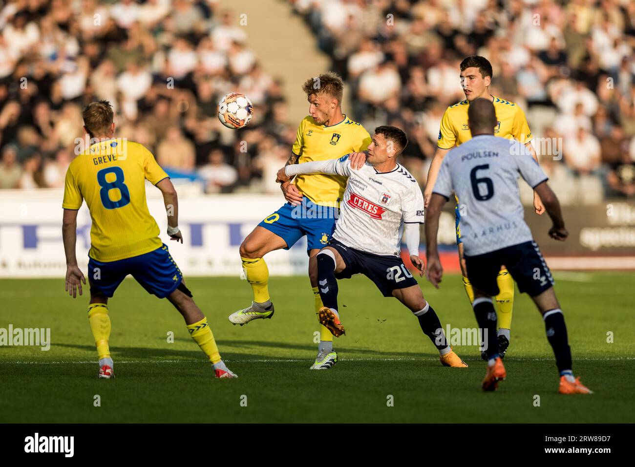 Aarhus, Denmark. 17th Sep, 2023. Mikkel Duelund (20) of Aarhus GF and Daniel Wass (10) of ...