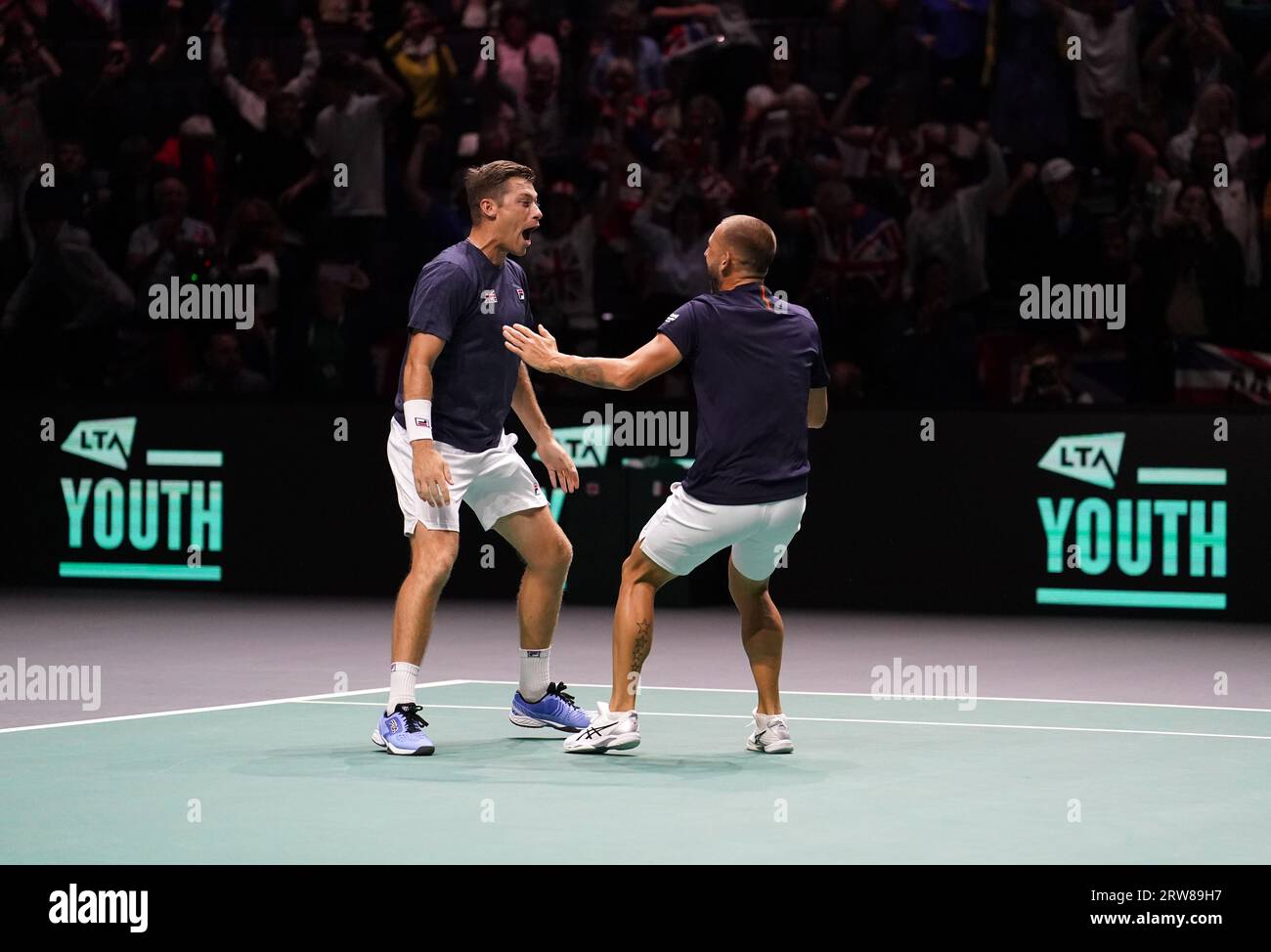 Great Britain's Neal Skupski and Daniel Evans celebrate victory against ...