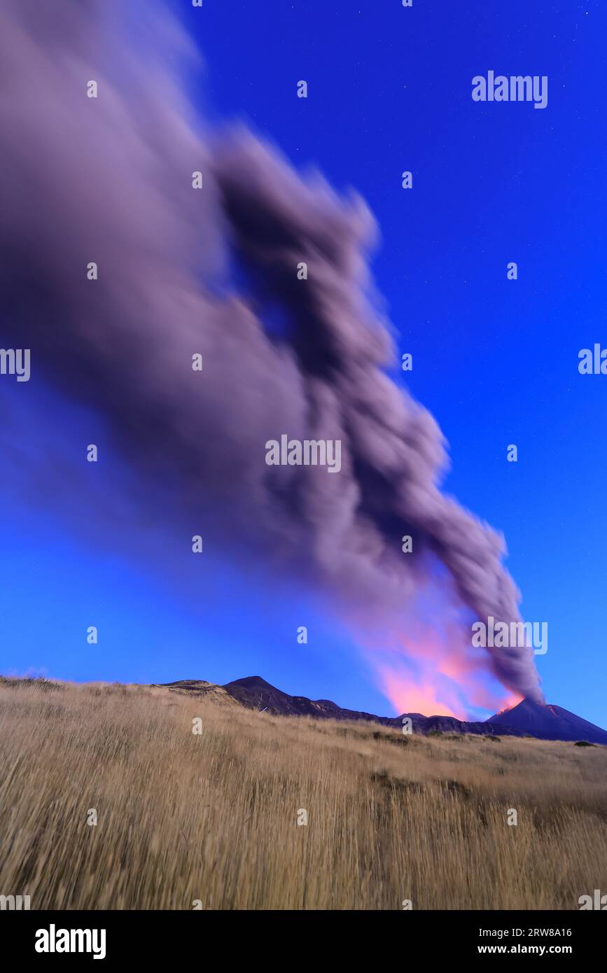 Eruption of Etna volcano seen at dawn with large ash emissions from the ...