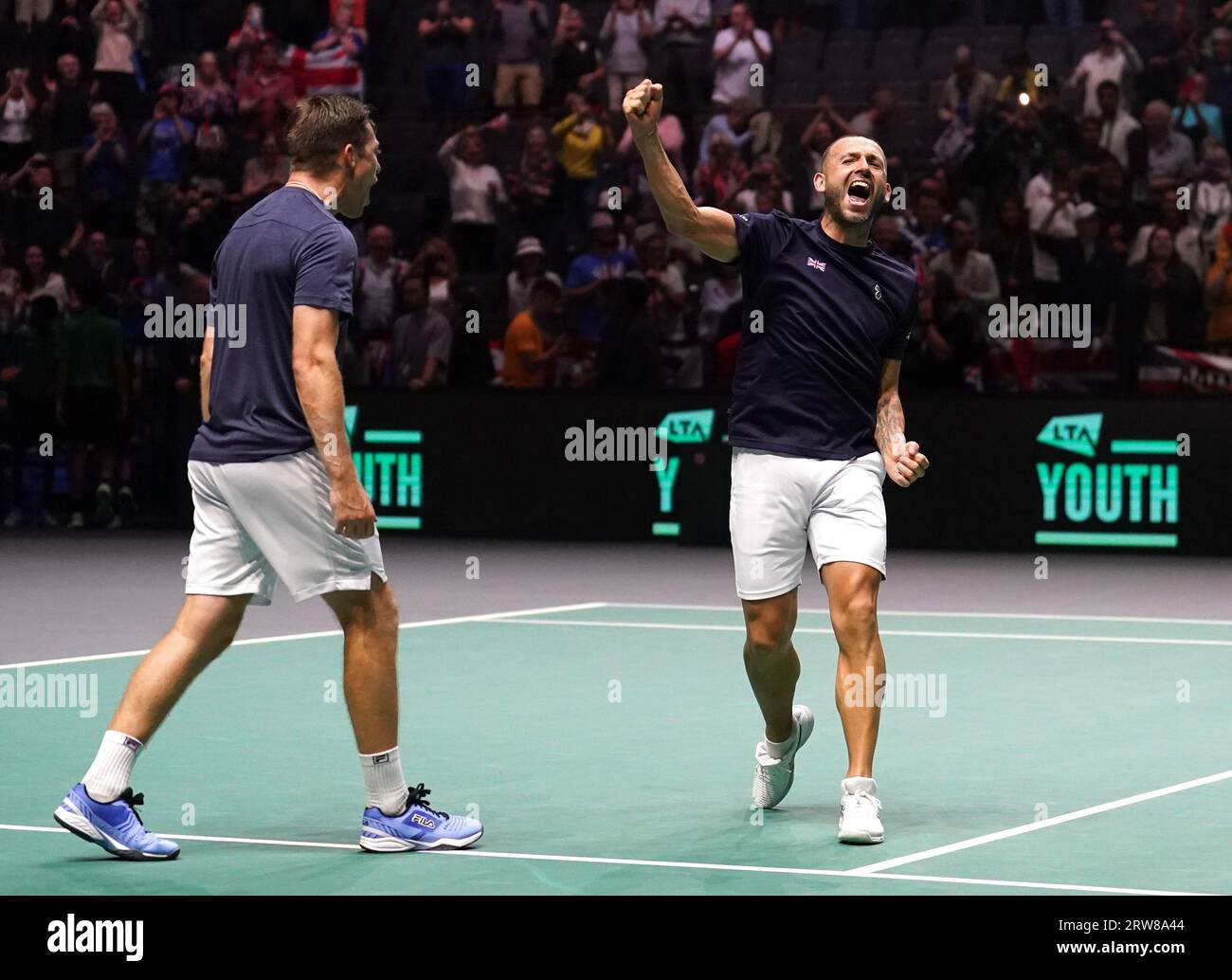 Great Britain's Neal Skupski and Daniel Evans celebrate victory against ...