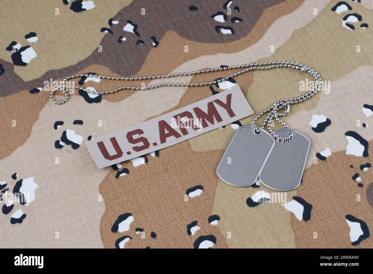 US ARMY desert uniform with dog tags Stock Photo - Alamy