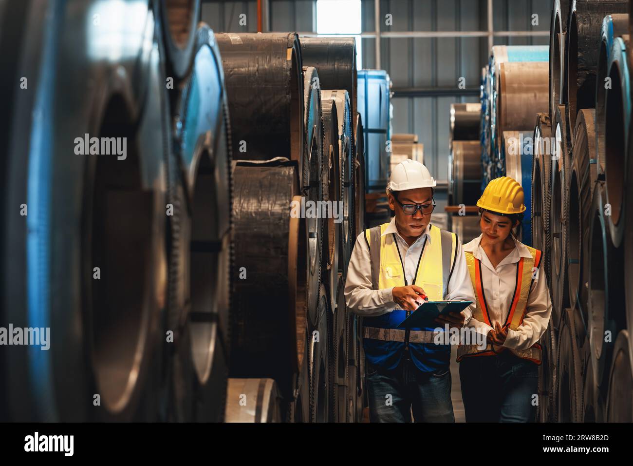 Warehouse inventory management in metalwork factory with engineer or ...