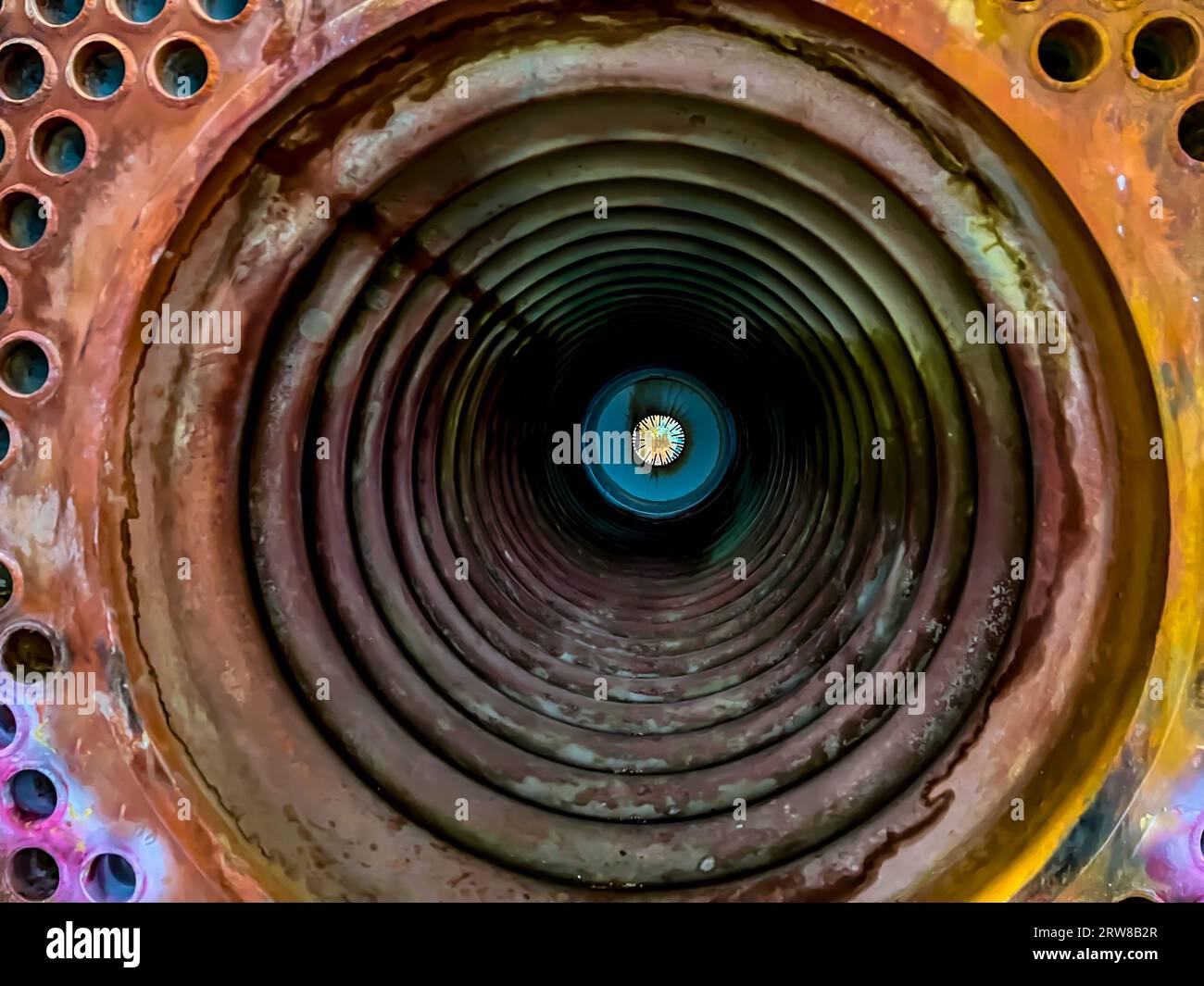 Central firing chamber of a plate and tube boiler that is open for ...