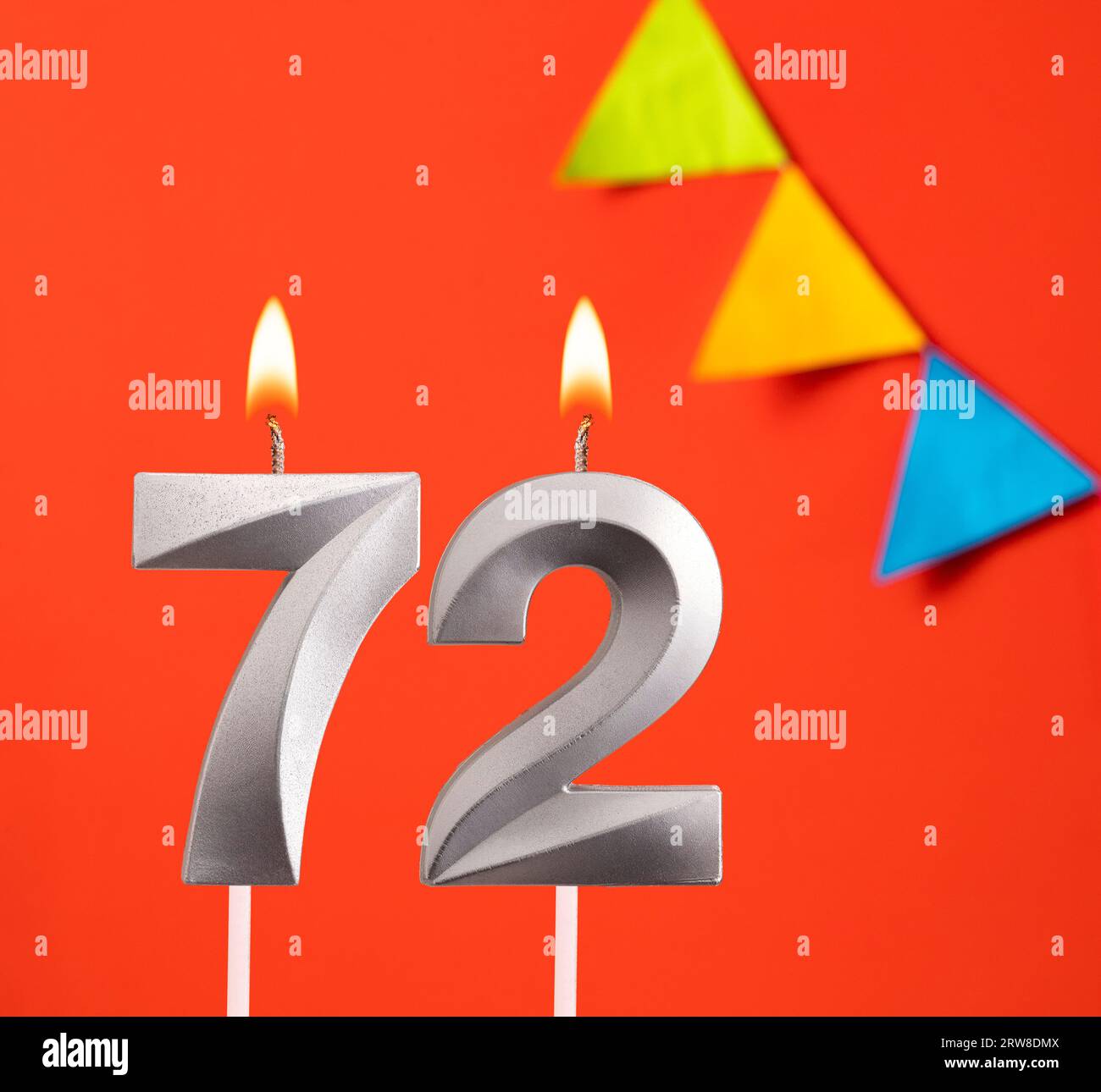 Birthday card - Number 72 candle in orange background Stock Photo - Alamy