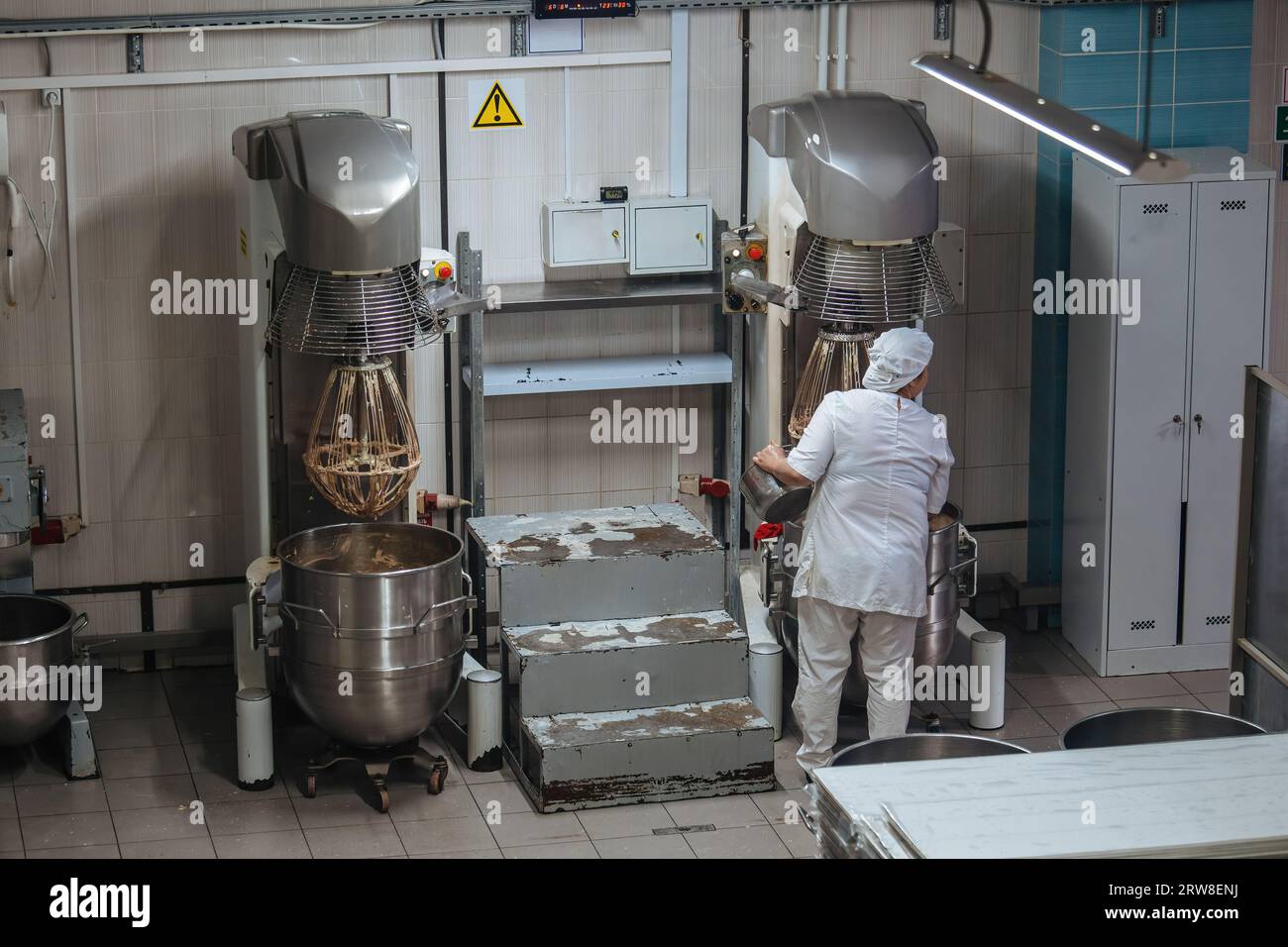 Confectionery. Marshmallow production line. Mixing of raw solution for ...