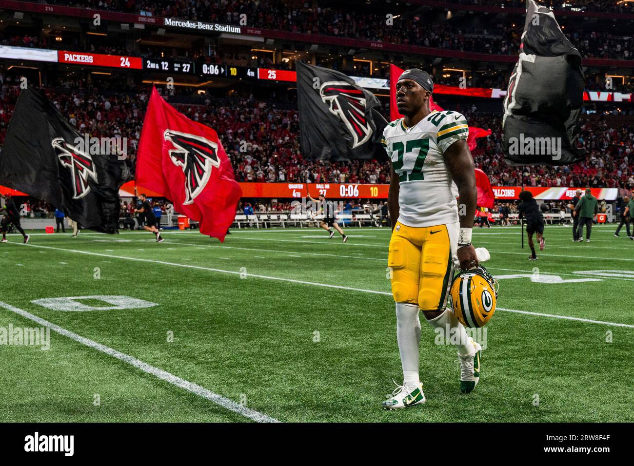Green Bay Packers running back Patrick Taylor (27) walks off the field ...