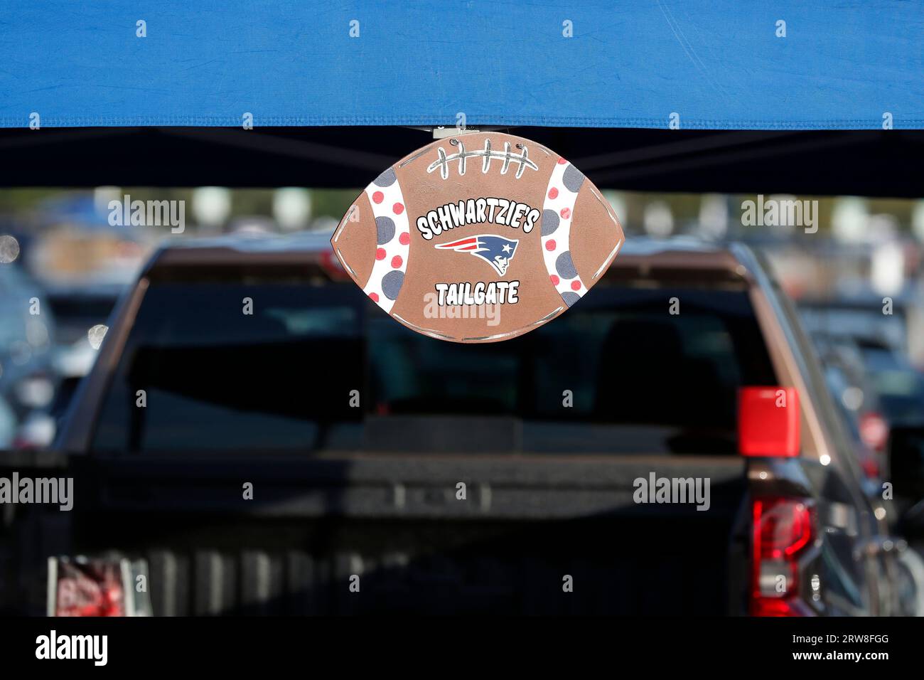 People tailgate outside Gillette Stadium before an NFL football game ...