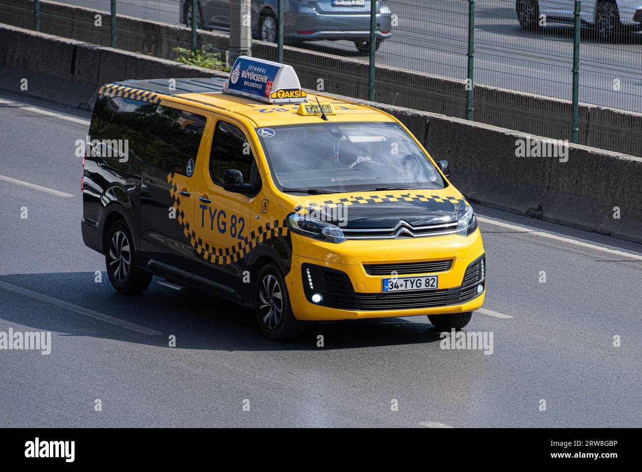 ISTANBUL, TURKEY - SEPTEMBER 17, 2022: Turkish minibus taxi on the way ...