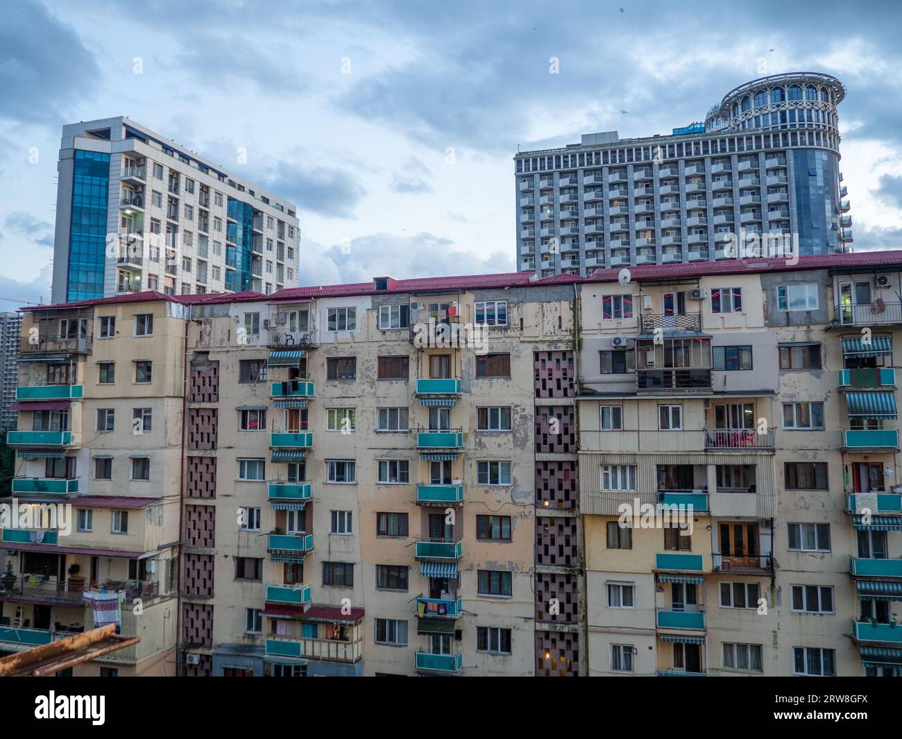 Batumi architecture concept. old house against the backdrop of a new ...