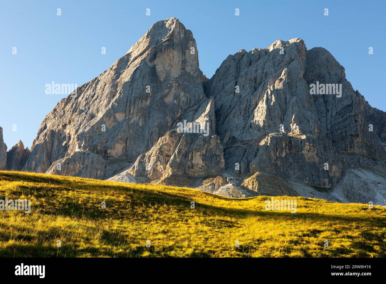 Mountain peak of Mont-de-Fornel, Dolomites stands majestically between ...