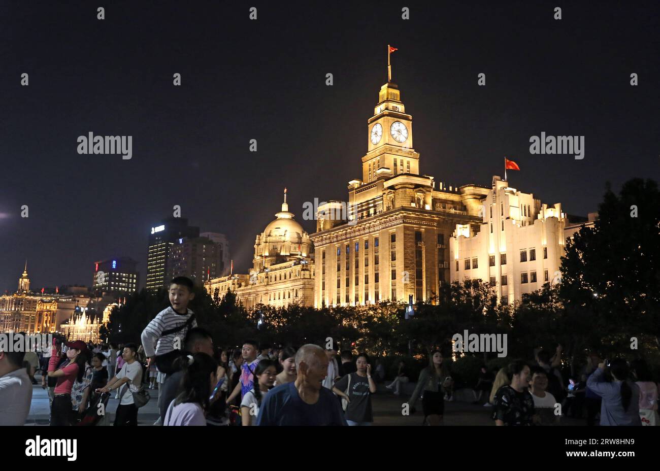SHANGHAI, CHINA - SEPTEMBER 16, 2023 - Tourists walk into the Bund ...