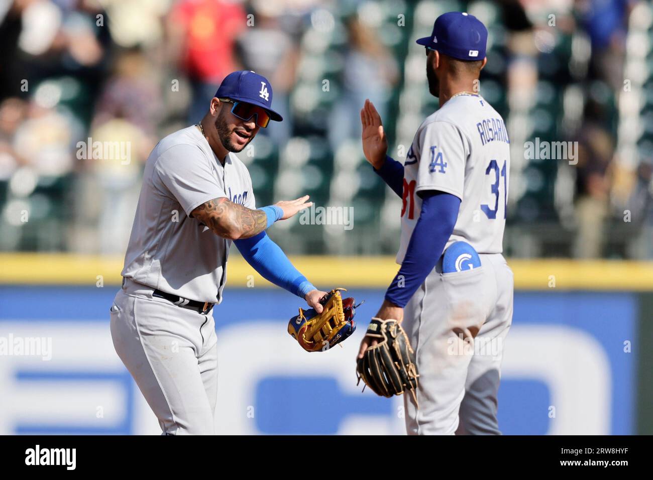 Los Angeles Dodgers right fielder Jason Heyward, left, celebrates with ...