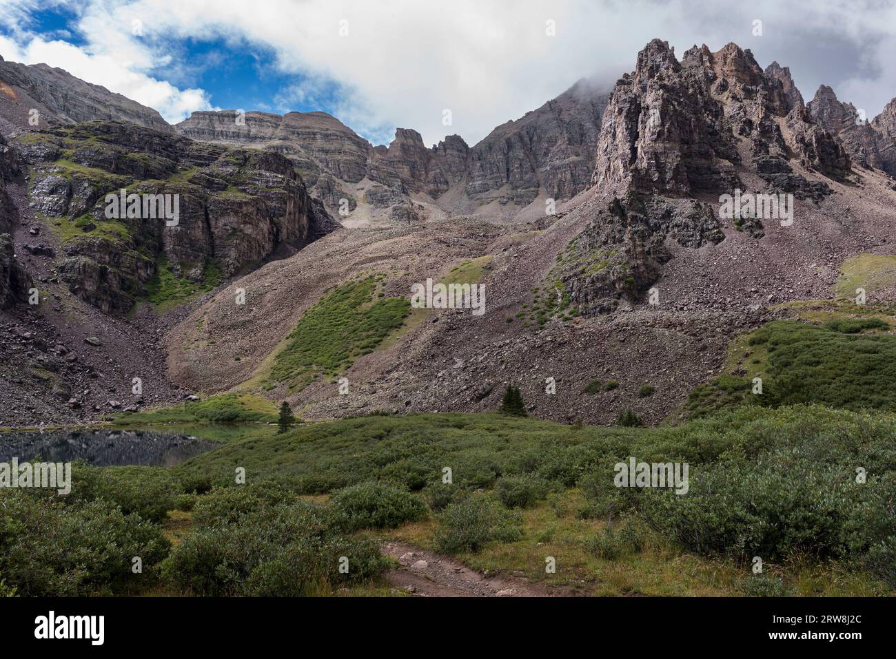 13,943 Foot Cathedral Peak is obscured by storm clouds in this dramatic ...