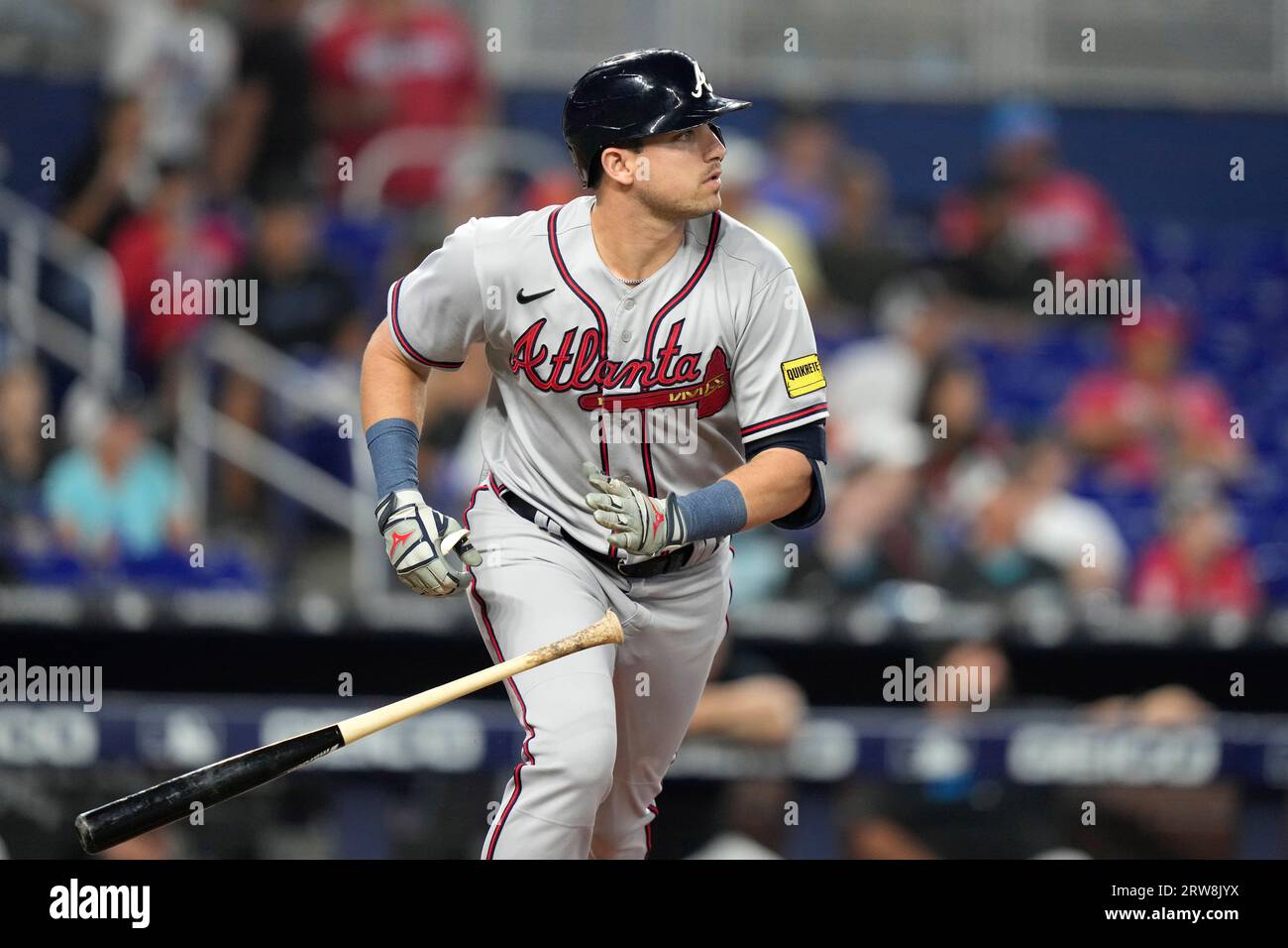 Atlanta Braves' Austin Riley watches as he flies out during the first ...